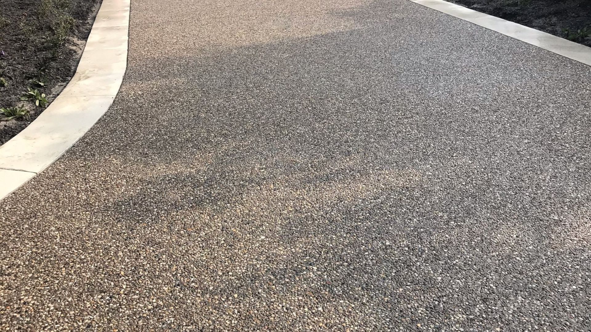 Ultimate Guide To Exposed Aggregate Vs Stamped Concrete Cost NZ